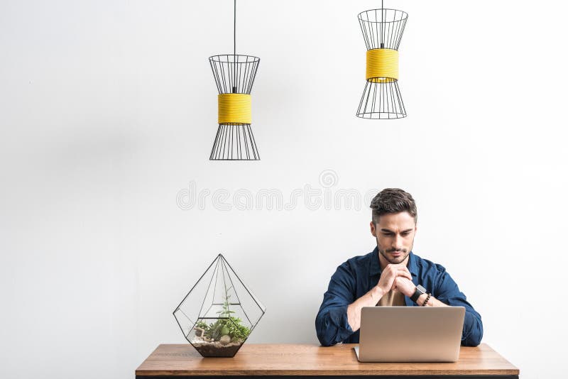 Severe Youthful Guy Using His Computer at Home Room Stock Photo - Image ...