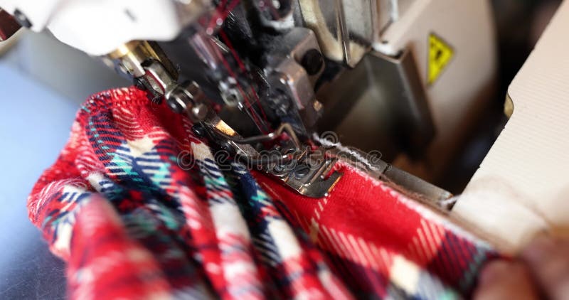 Sew Seam of a Flannel Shirt in Red Checkered Pattern Using Sewing ...