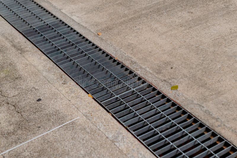 Sewage Drain Grate on the Cement Floor Editorial Stock Image - Image of ...
