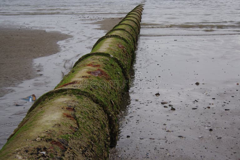 Sewage Outflow Pipe stock image. Image of kits, beach - 14385869