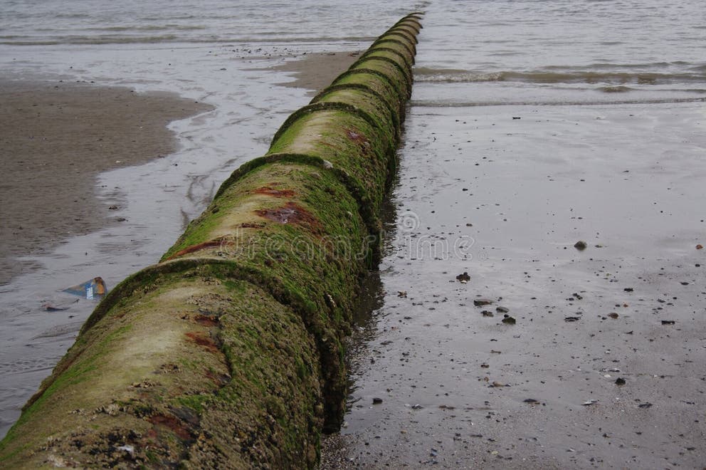 Sewage Outflow Pipe stock image. Image of kits, beach - 14385869