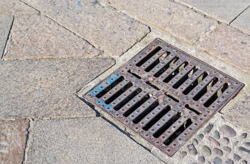 Sewer cover on roadway stock photo. Image of street, canada - 74005532