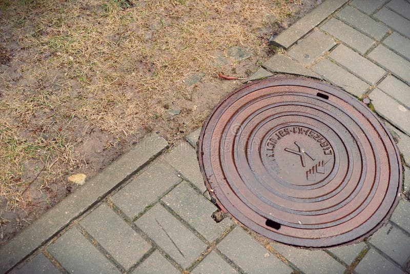 Sewer manhole wet stock photo. Image of ground, rain - 111988286
