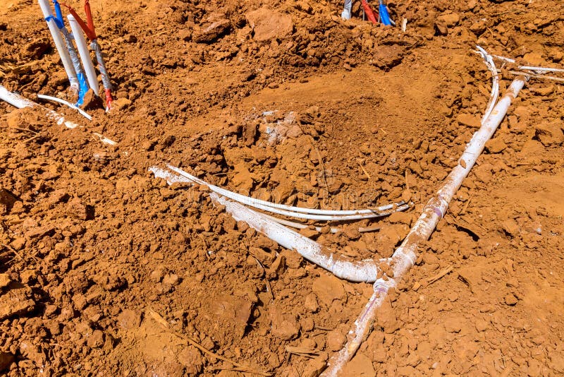 Sewer Pipe Laying from the Ground during the Construction Stock Photo ...