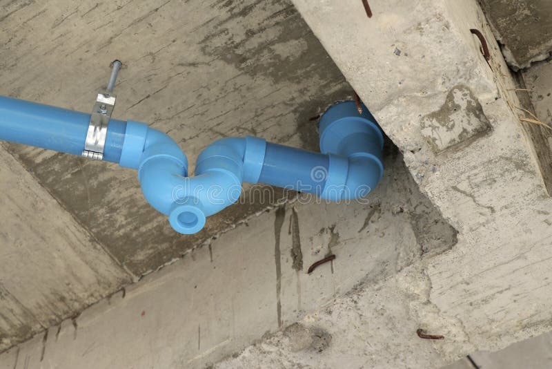 New Home Under Construction Plumbing Drain Pipes Inside a House Frame ...