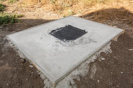 Sewerage Construction. the Hatch on a Pit for a Septic Tank. Stock ...
