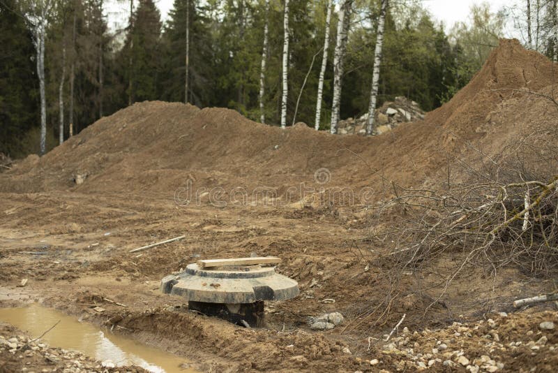 Sewerage at Construction Site. Excavated Earth for Foundation Stock ...