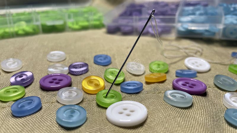 Sewing Accessories: Buttons, Needles, and Thread in Different Colors ...