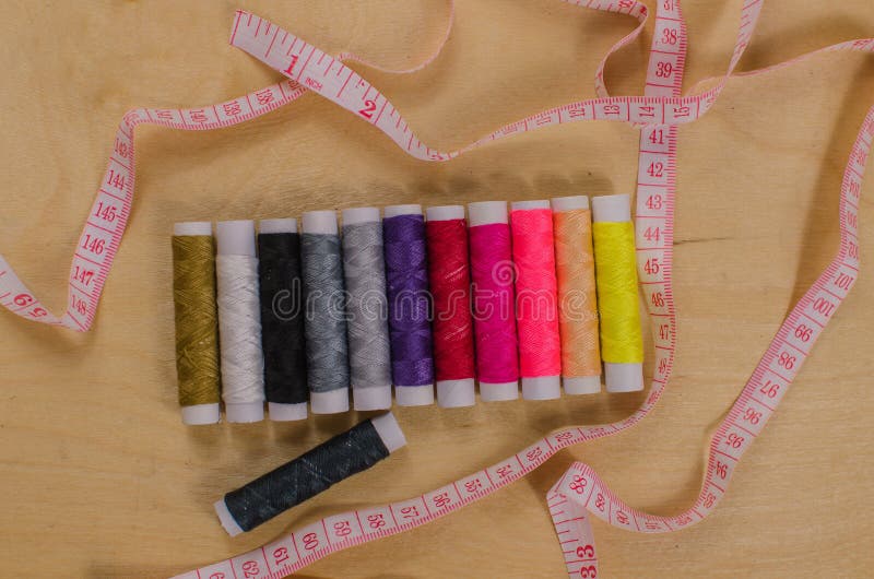 Sewing Accessories. Spools of Thread with Different Colors of Rainbow ...