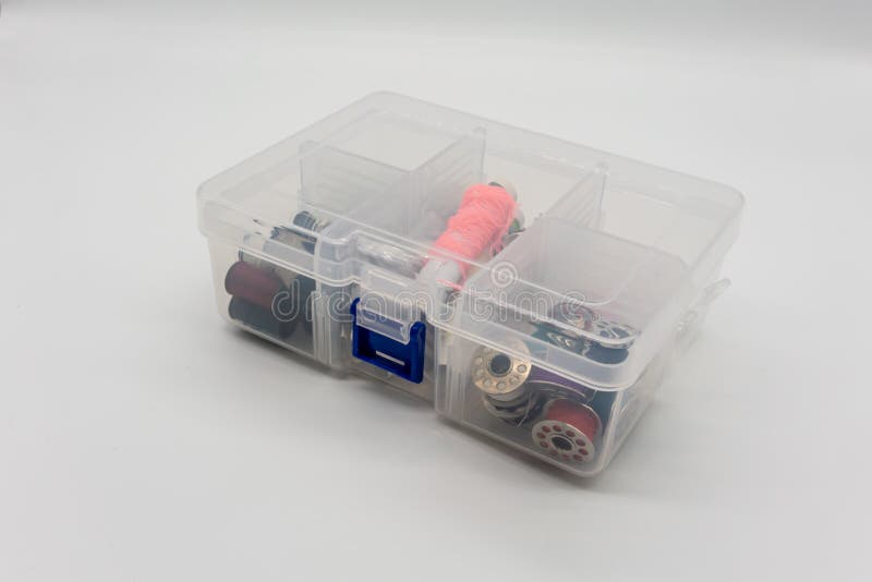 Sewing Accessories and Threads in the Clear Plastic Box on White Stock ...