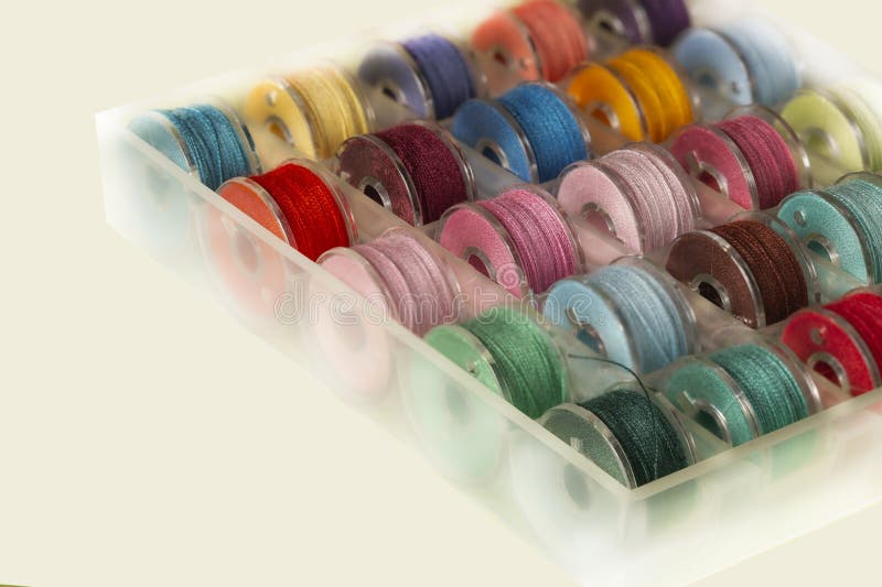 Sewing Bobbins with Colored Threads Red, Blue, Green Stock Image ...