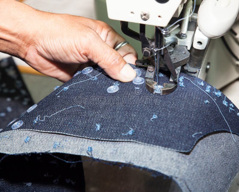 Sewing on buttons editorial photo. Image of garment, sewing - 42130976