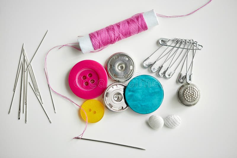 Sewing Buttons, Needles, Pins and Thread Spool Stock Image - Image of ...