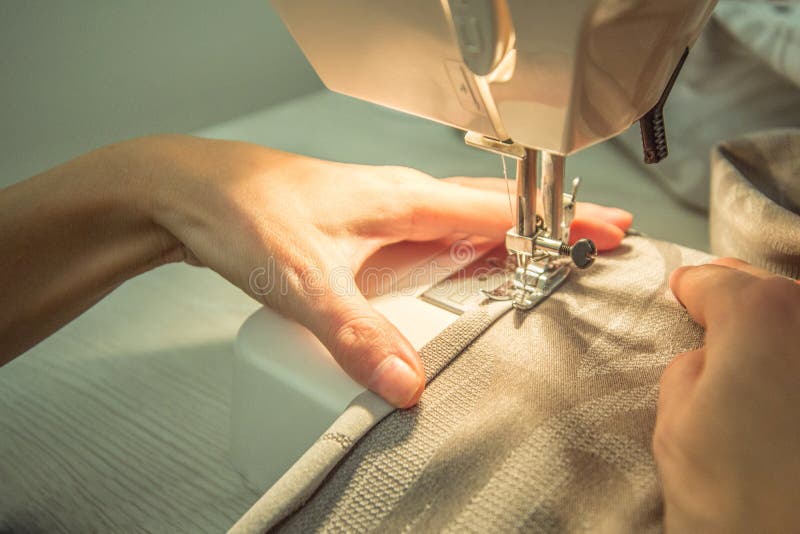 Sewing Clothes on a Sewing Machine Stock Photo - Image of conditions ...