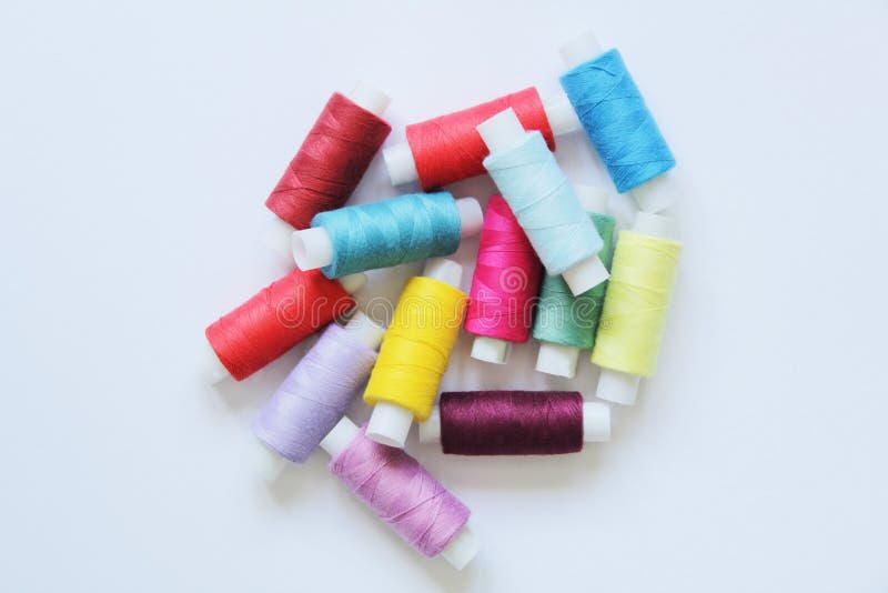 Sewing colored threads stock photo. Image of industry - 77141568