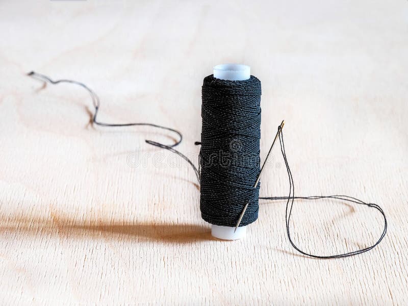 Spool with Black Thread and with a Needle Stock Image - Image of ornate ...