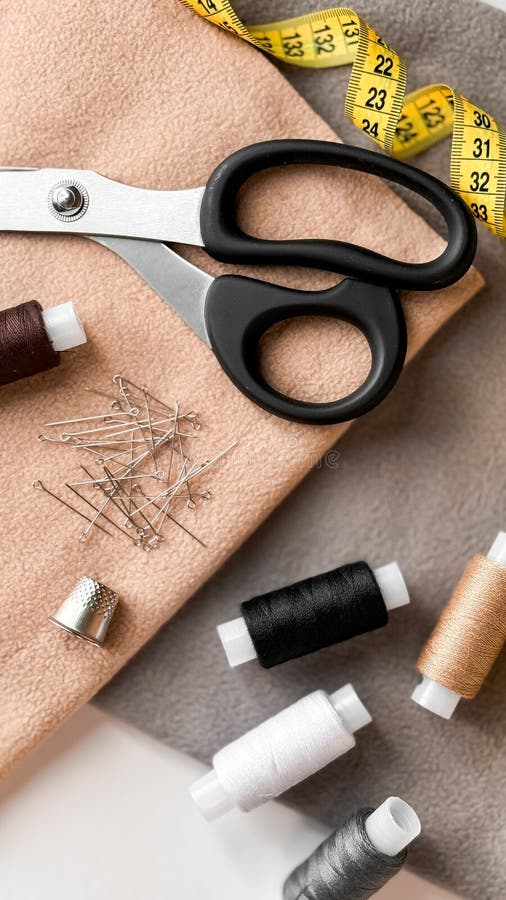 Sewing Essentials. Scissors, Tape Measure, Pins, and Various Thread ...
