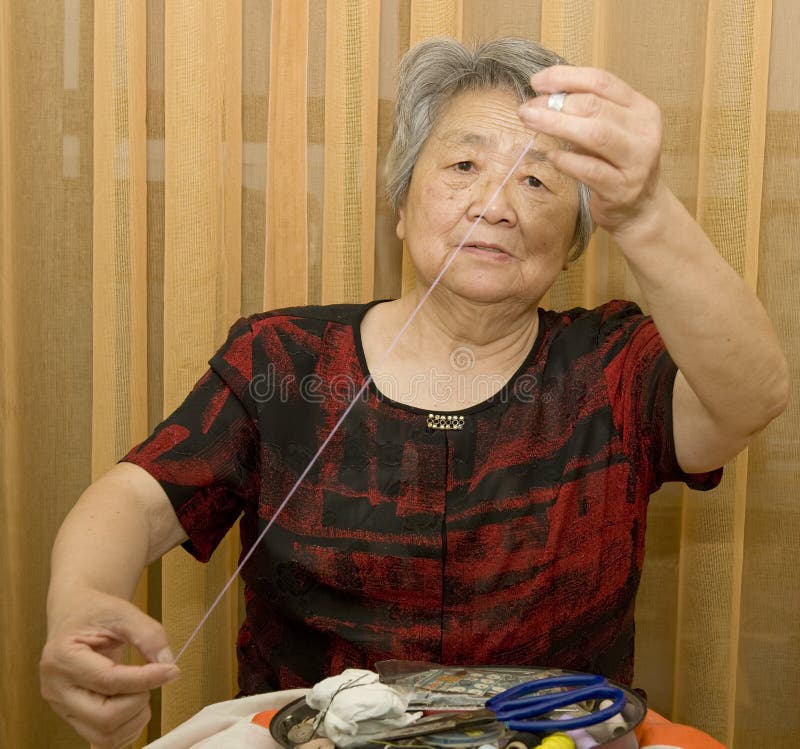 Sewing grandma stock photo. Image of grandmother, gaze - 20837376