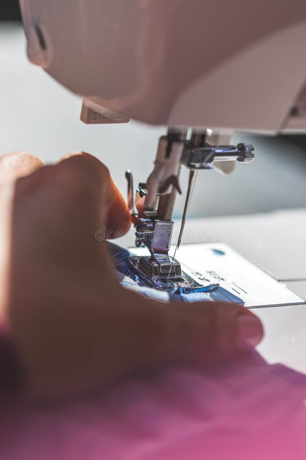 Sewing at Home: Woman is Sewing at Home, Close Up of Sewing Needle ...
