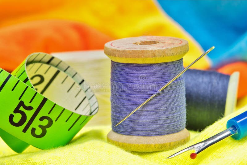 Sewing Item Tools on Colored Clothing with Macro Details. Stock Image ...