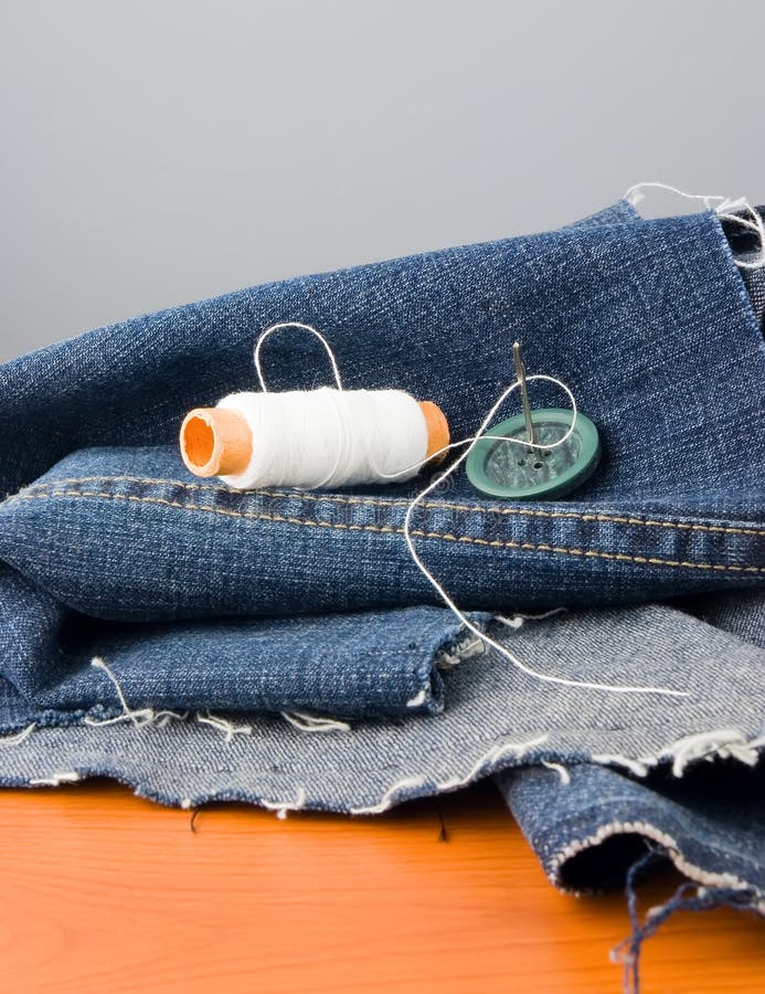 Sewing jeans stock photo. Image of textile, tailor, cotton - 12970072