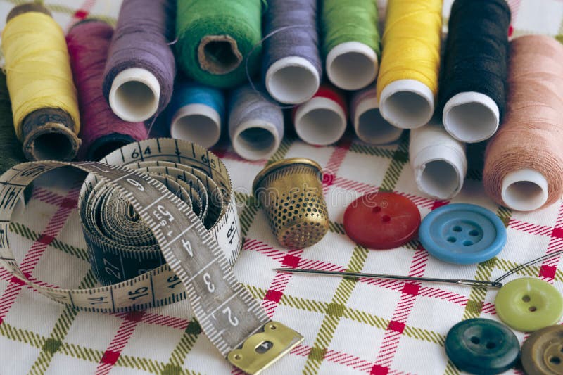 Sewing Kit Consisting Needle, Thimble, Threads and Measuring Meter on a ...