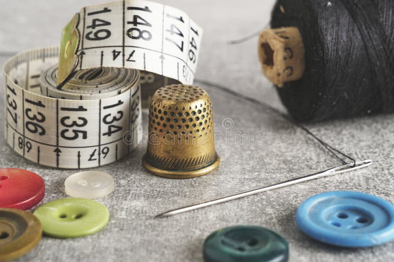 Sewing Kit of Needle, Thimble, Thread and Measuring Meter.on Gray ...
