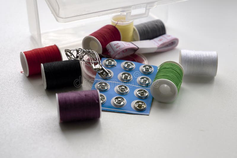 Sewing Kit Thread Needles Pins and Measuring Tape on the Table Stock ...