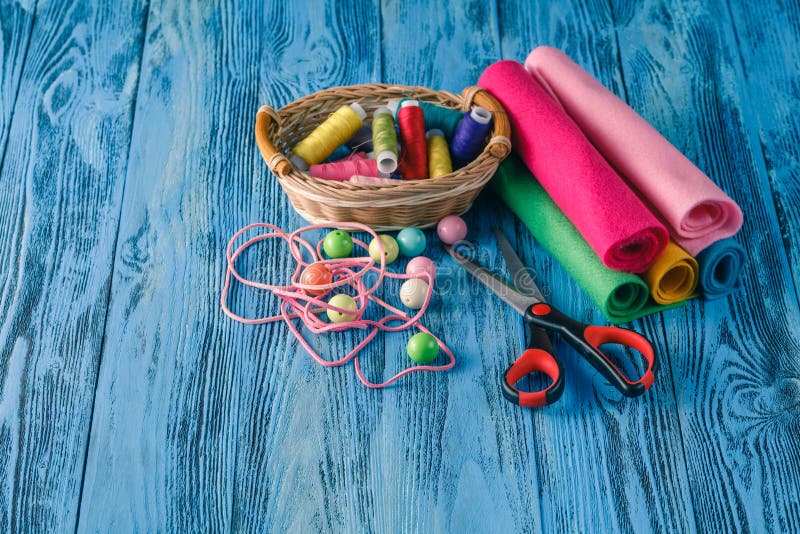 Sewing Kit on a Wooden Table. Thread, Needles, Scissors and a To Stock ...