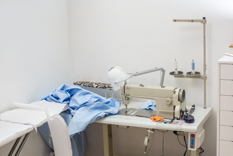 Sewing Machine and the Blue Cloth Stock Image - Image of metal ...