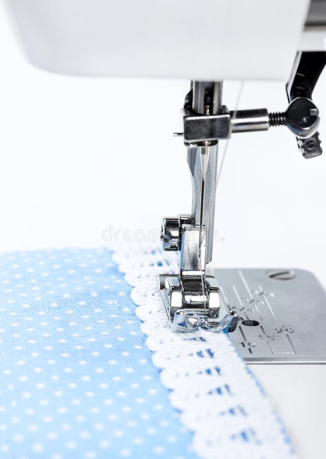 Sewing Machine with Blue Cloth and White Lace Stock Image - Image of ...