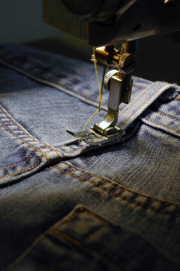 Sewing Machine and Blue Jeans Stock Image - Image of steel, macro: 4269357