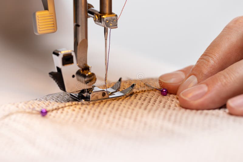 Sewing Process - Women`s Hands at Her Sewing. Studio Shot with Lighting ...