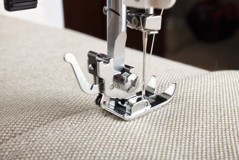 Sewing Machine Foot and Item of Clothing Stock Photo - Image of ...