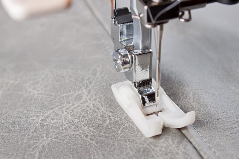 Sewing Machine Foot and Item of Clothing Stock Photo - Image of ...