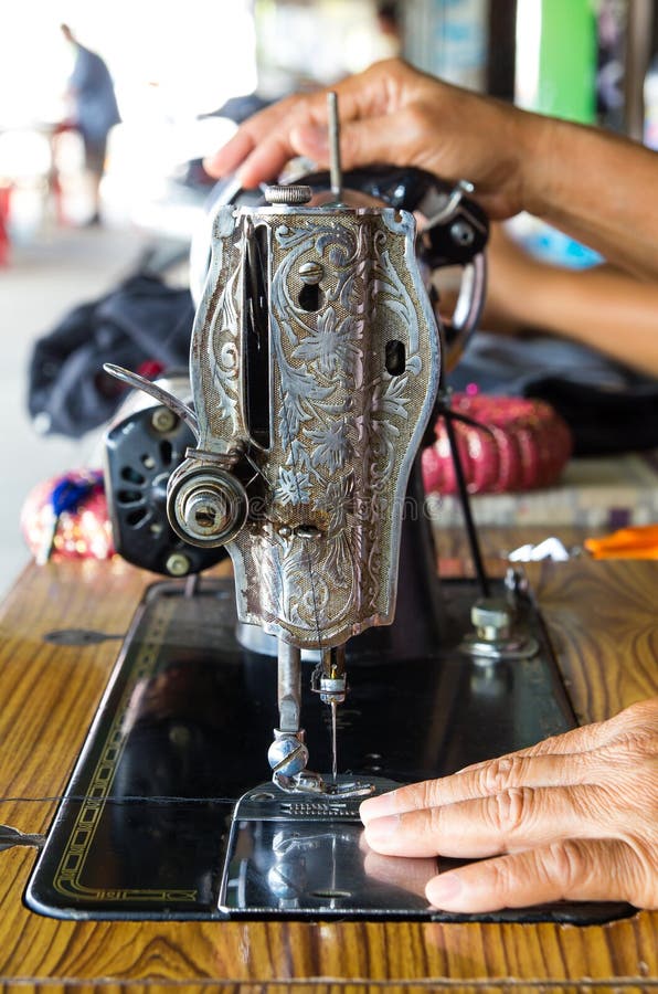 Sewing machine and hand stock photo. Image of industry - 45805166