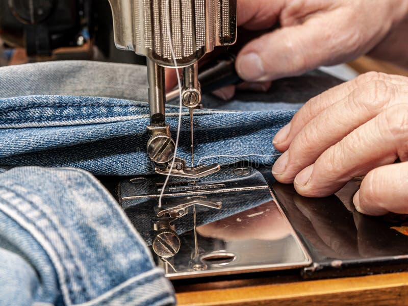 Sewing Machine and Item of Clothing Stock Photo - Image of macro, cloth ...