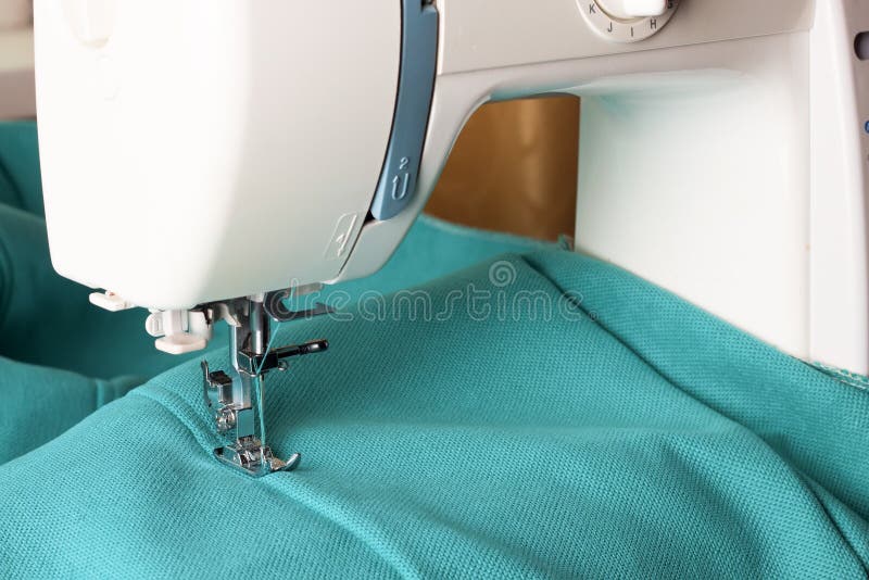 A Sewing Machine and Item of Clothing . Stock Image - Image of craft ...