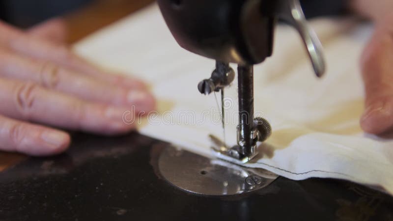 Sewing Machine Needle in Motion. Close-up of Sewing Machine Needle ...