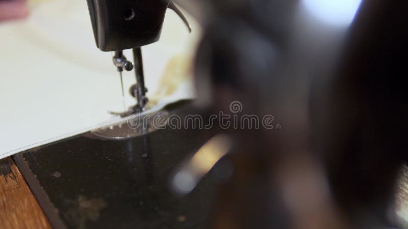 Sewing Machine Needle in Motion. Close-up of Sewing Machine Needle ...