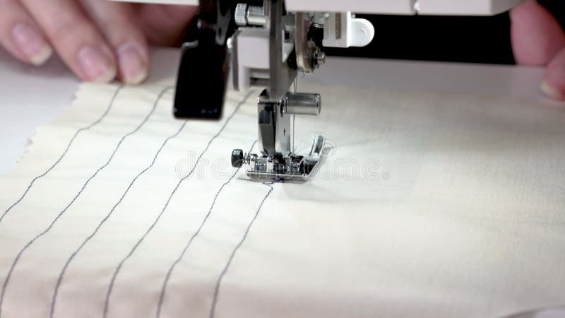 Sewing Machine Needle in Motion. Close-up of a Sewing Machine Needle ...