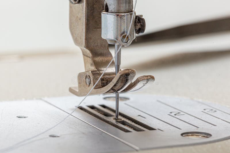 Sewing Machine Needle with Thread and Fabric Stock Photo - Image of ...