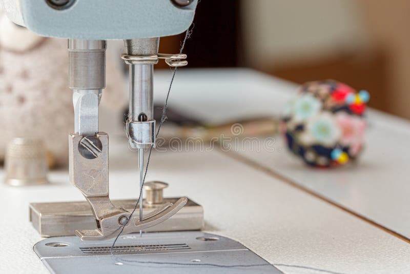 Sewing Machine Needle with Thread and Fabric Stock Photo - Image of ...