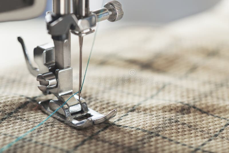 Work in Process - Sewing Machine and Hand of Tailor with Needle, Thread ...