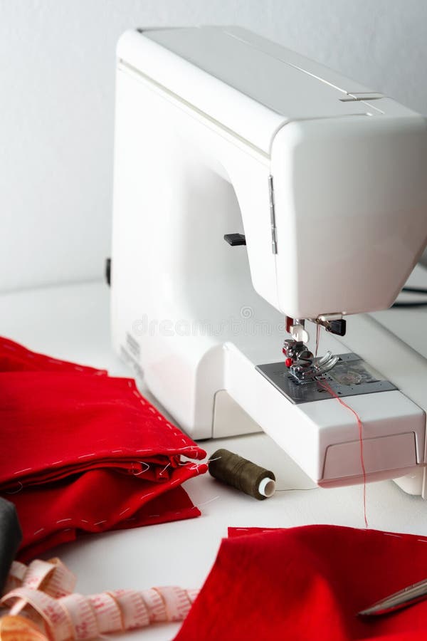 Sewing Machine with Red Fabric Stock Photo - Image of equipment, fabric ...