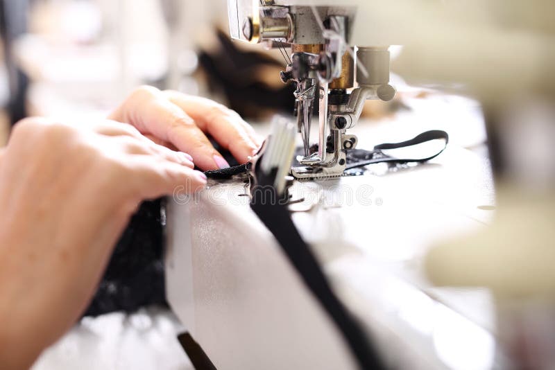 Sewing on a machine stock image. Image of lockstitch - 59758199