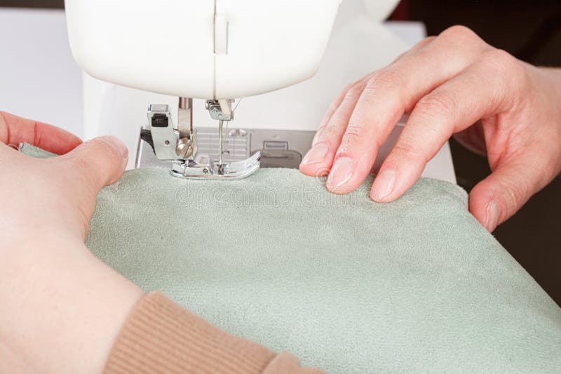 Sewing Machine, Stitching Fabrics, Needle in a Round Plan Stock Photo ...