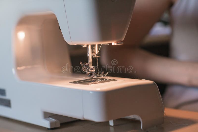Sewing machine on table stock photo. Image of cloth, industry - 83450296
