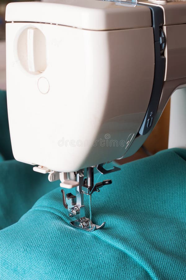 Sewing Machine and Turquoise Fabric Stock Image - Image of machine ...