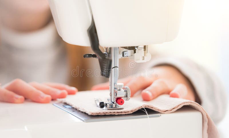Sewing machine in work stock photo. Image of indoors - 209254608